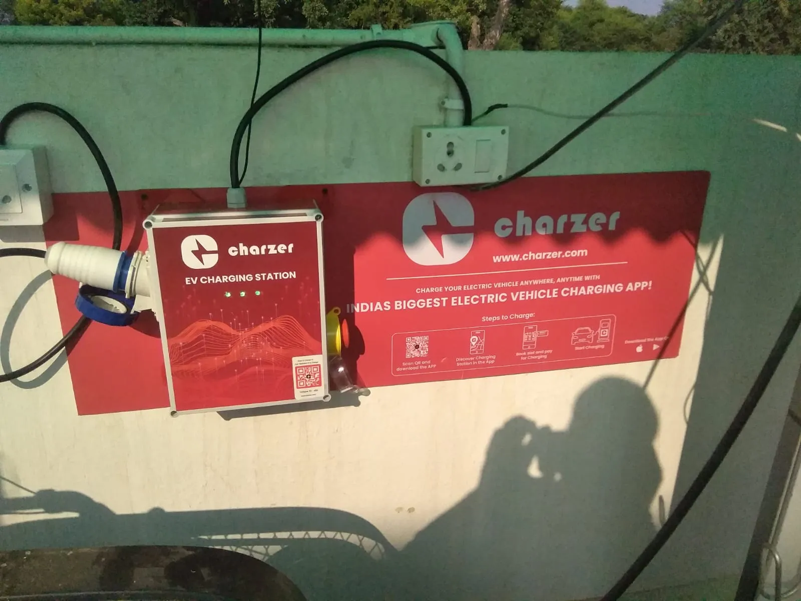 Charzer Partners With Nirman Developers To Install EV Charging Stations ...